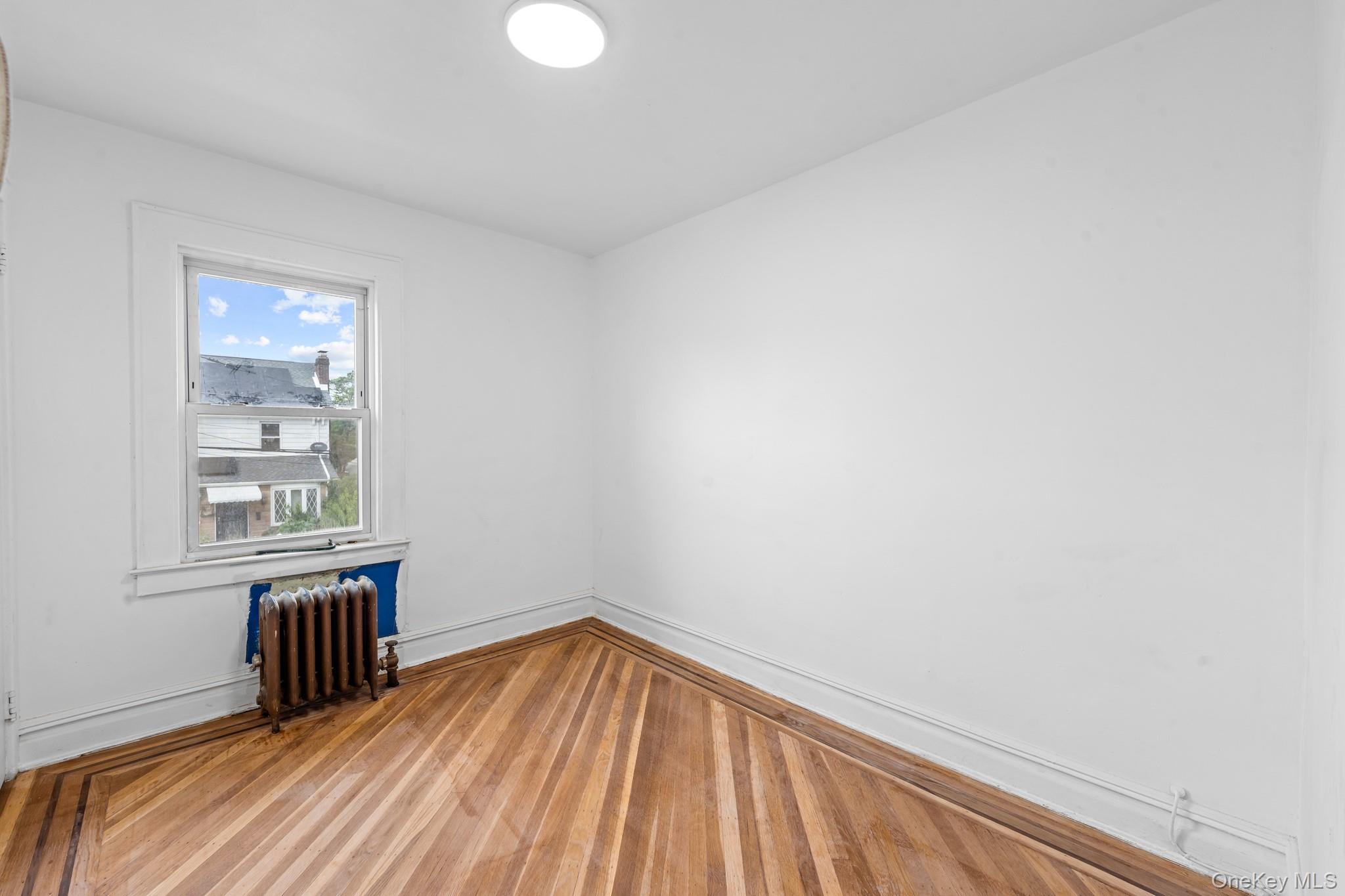 19716 99th Road, Hollis, NY 11423 | MLS #898411